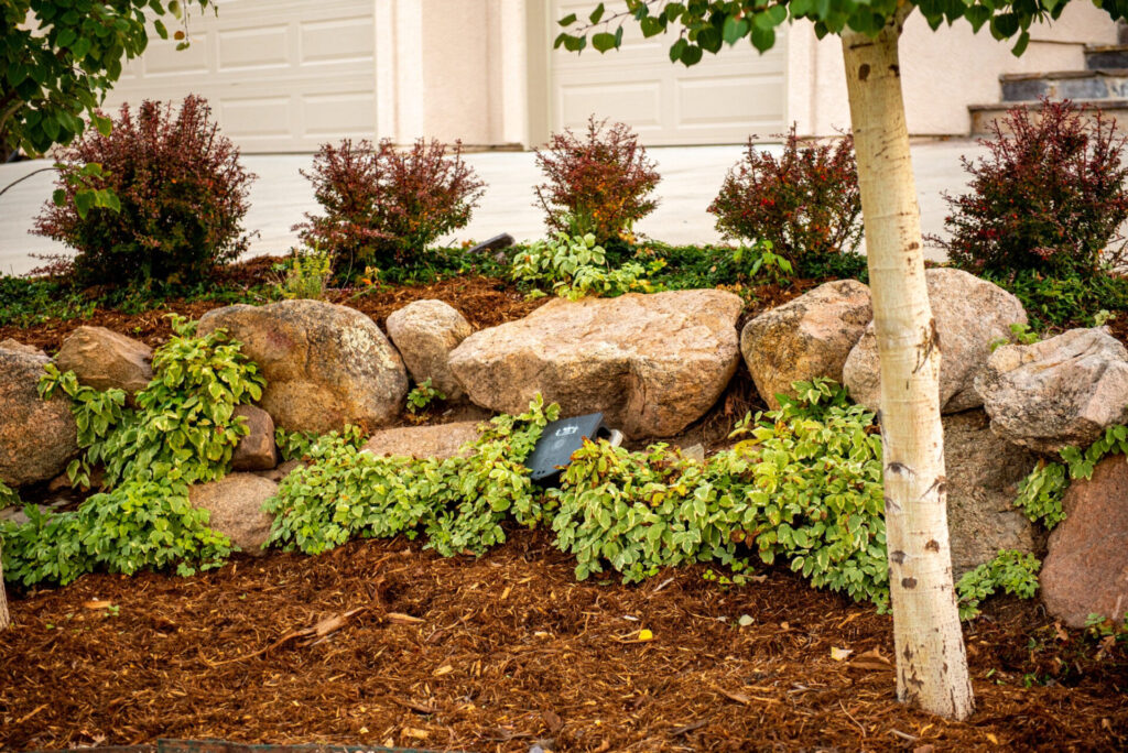 ivybrook-34- boulder retaining wall- plants » Colorado Stoneworks ...